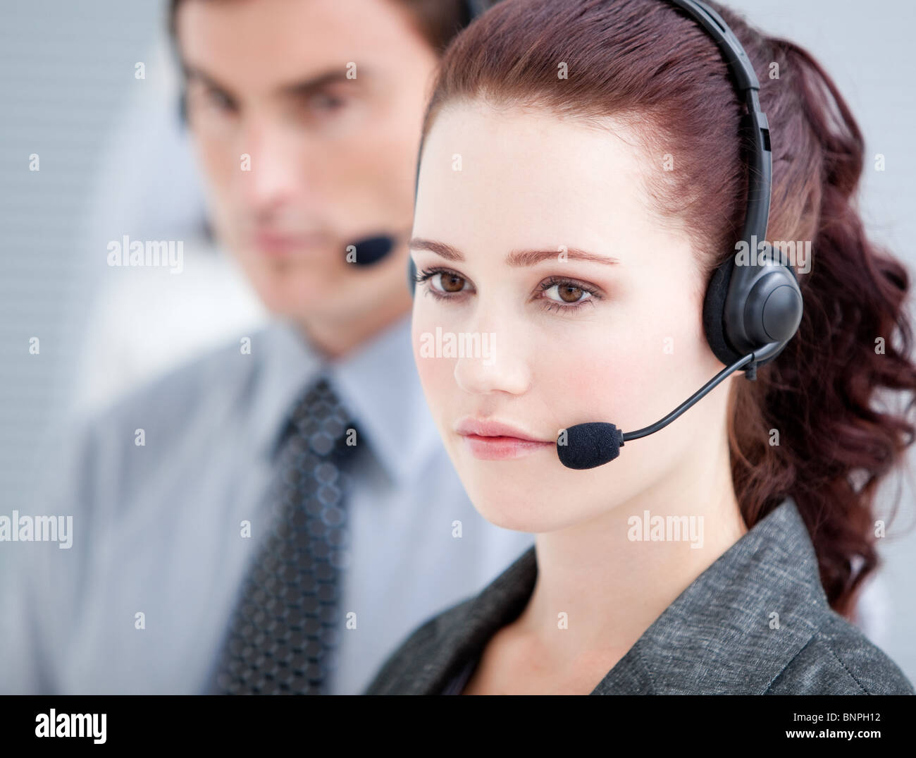 Assertive customer service representatives standing in a line Stock ...