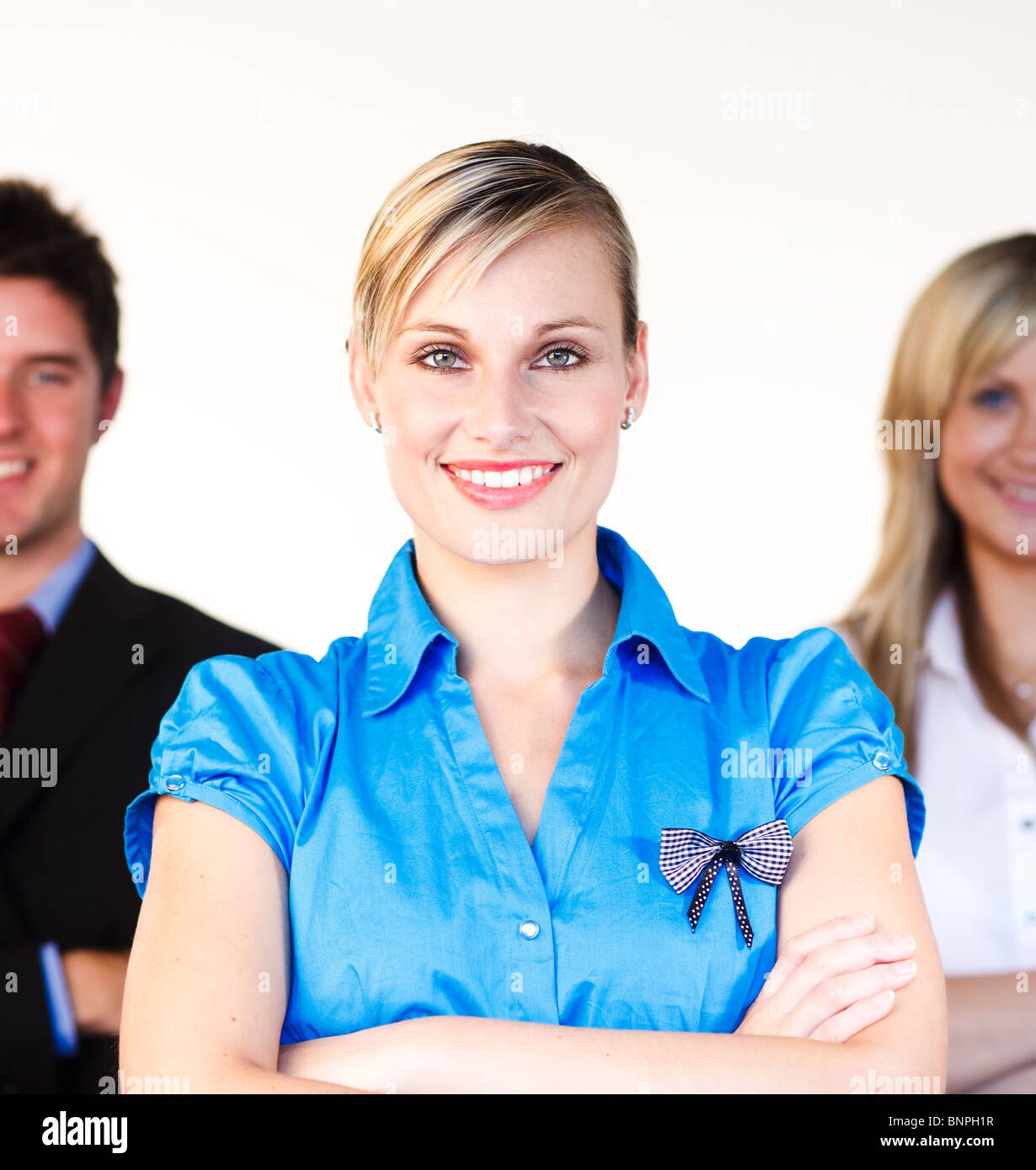 Beautiful businesswoman with her team in the background Stock Photo - Alamy