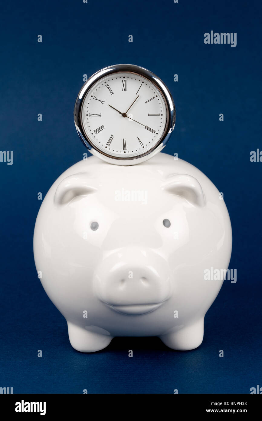 Piggy Bank and clock, Business concept Stock Photo - Alamy