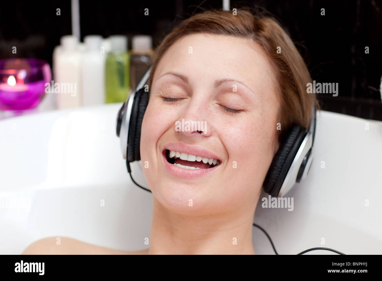 Woman music headphones bath hi-res stock photography and images - Alamy