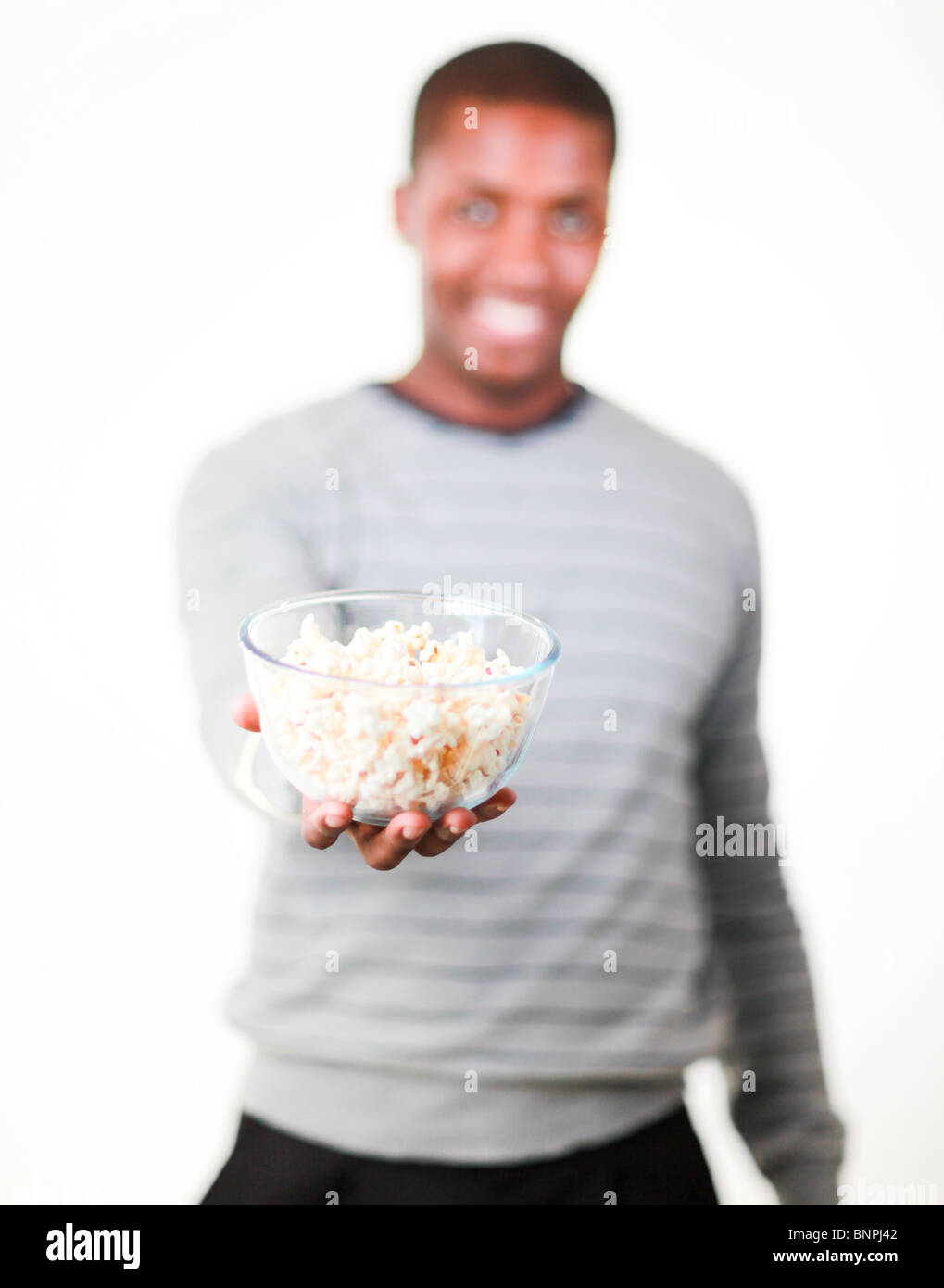 Man holding pop corn Stock Photo - Alamy