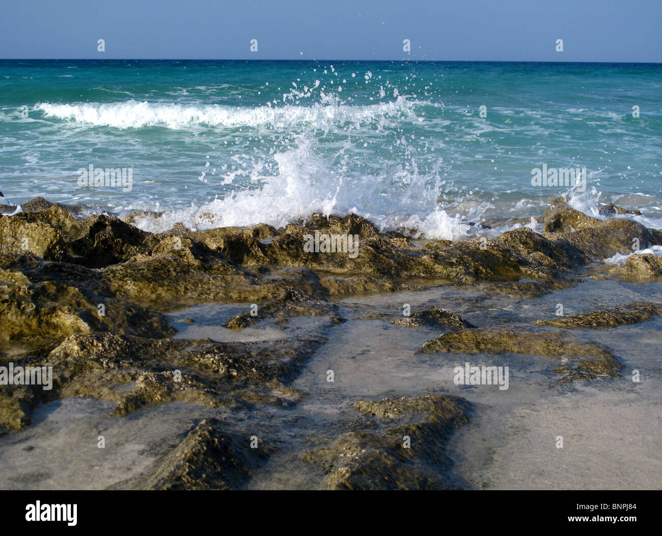 Seashore waves rocks hi-res stock photography and images - Alamy