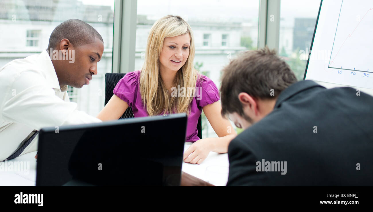 Business team working in an office Stock Photo - Alamy