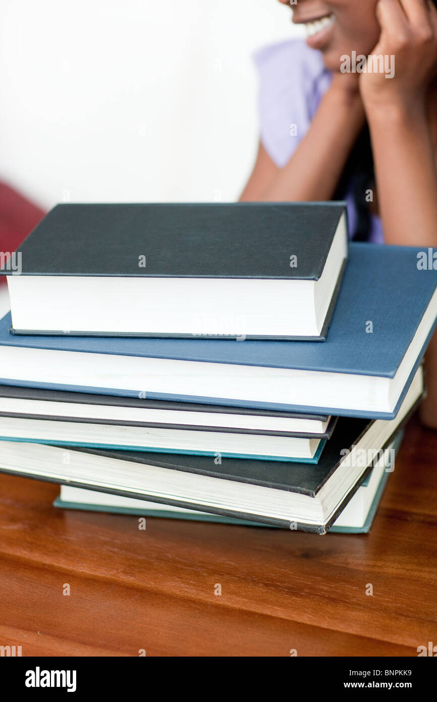 Stack of books on a table Stock Photo - Alamy