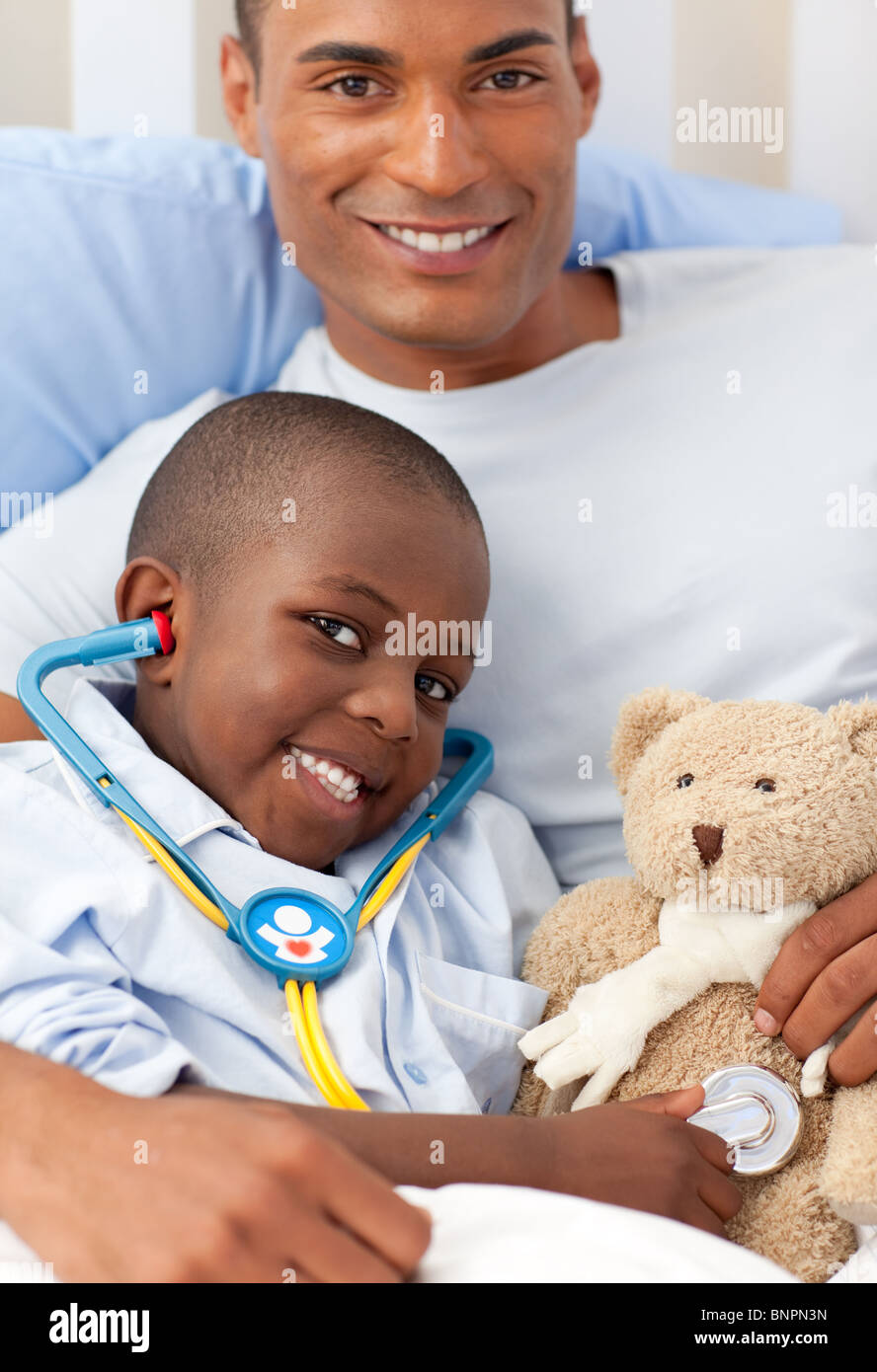 Father with his sick child Stock Photo - Alamy