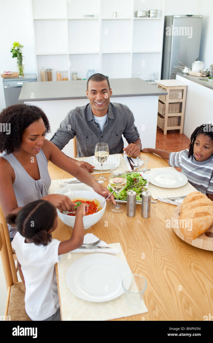 Family dining together Stock Photo - Alamy
