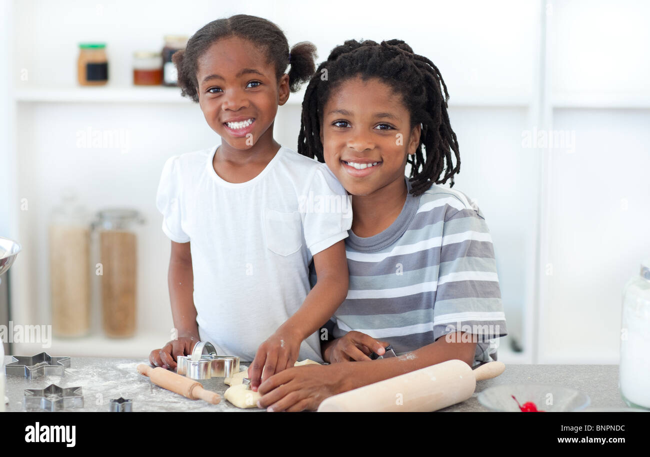 Child making biscuits hi-res stock photography and images - Alamy