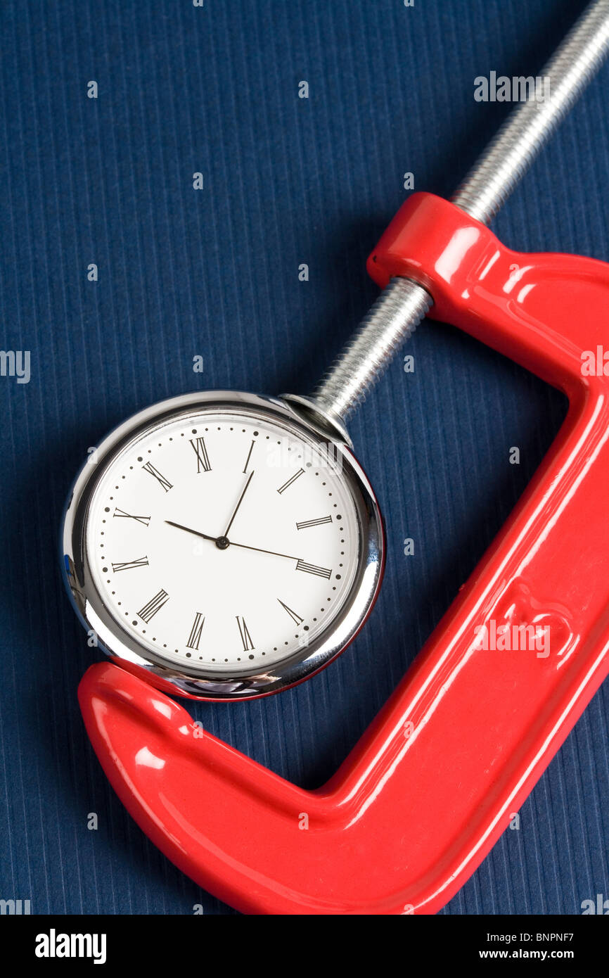 Vise Grip and Clock, Concept of busy Stock Photo - Alamy