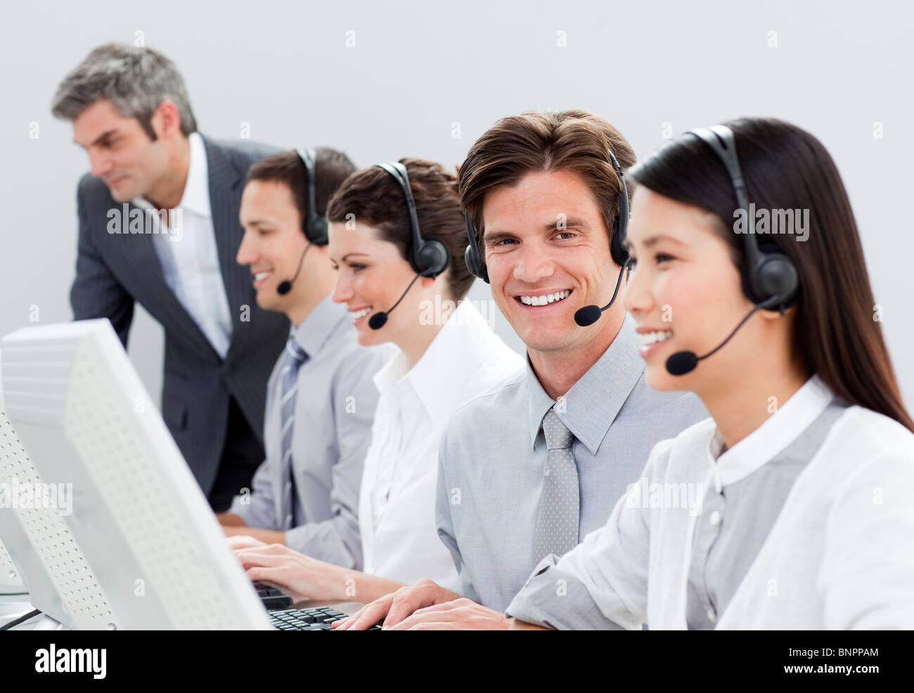 Self-assured customer service representatives Stock Photo - Alamy