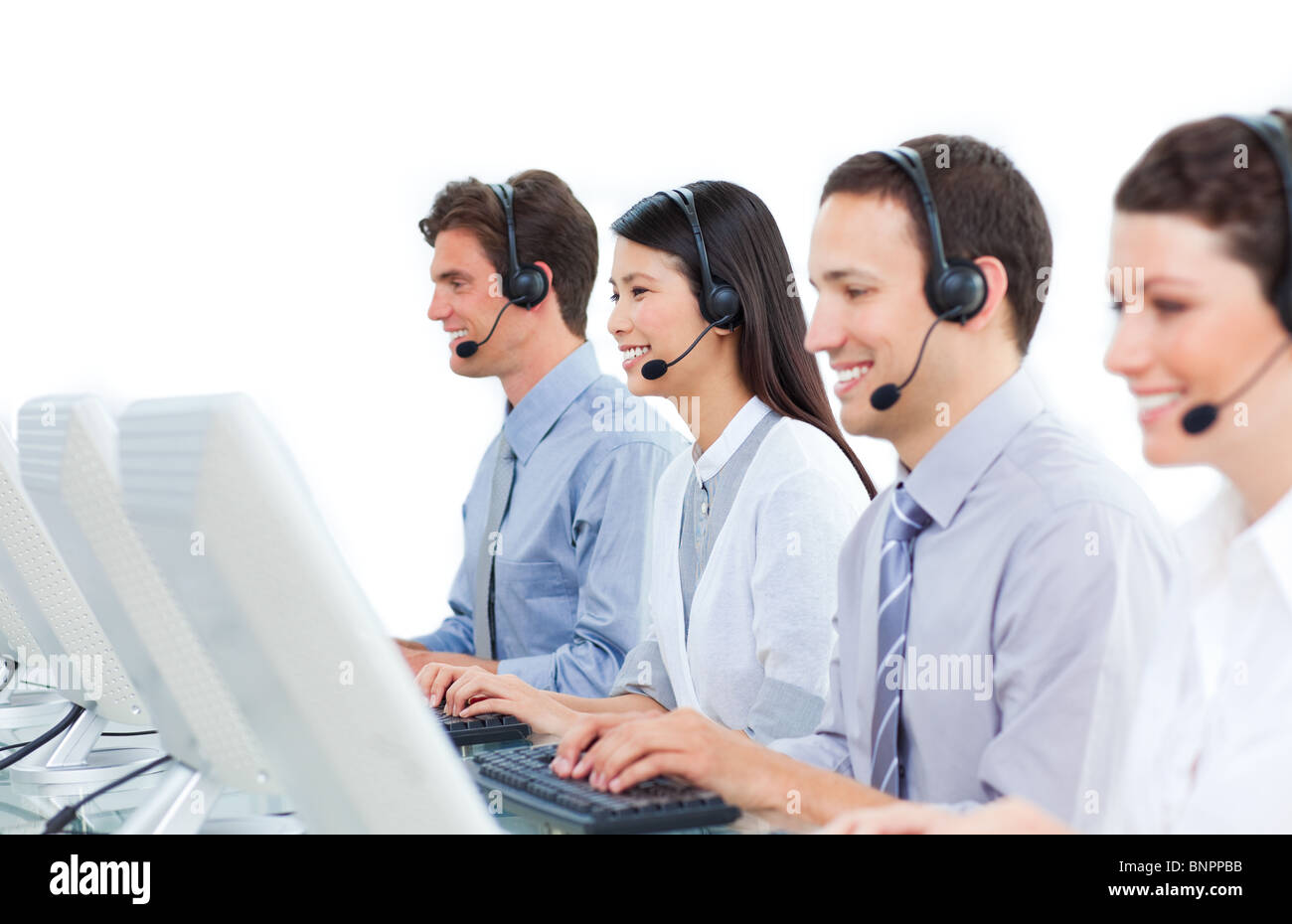 Smiling customer service representatives Stock Photo - Alamy