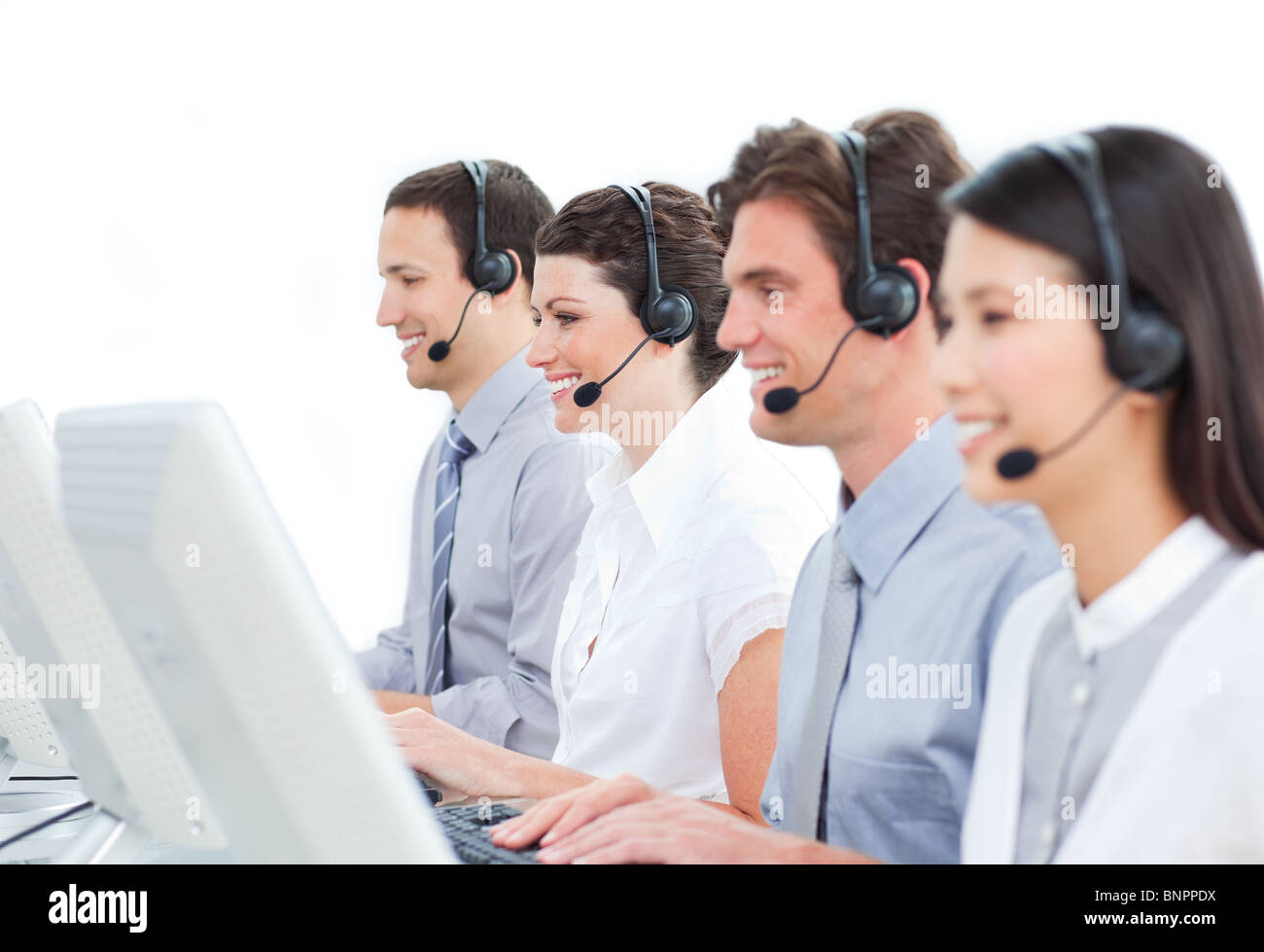 Delighted customer service representatives team Stock Photo - Alamy