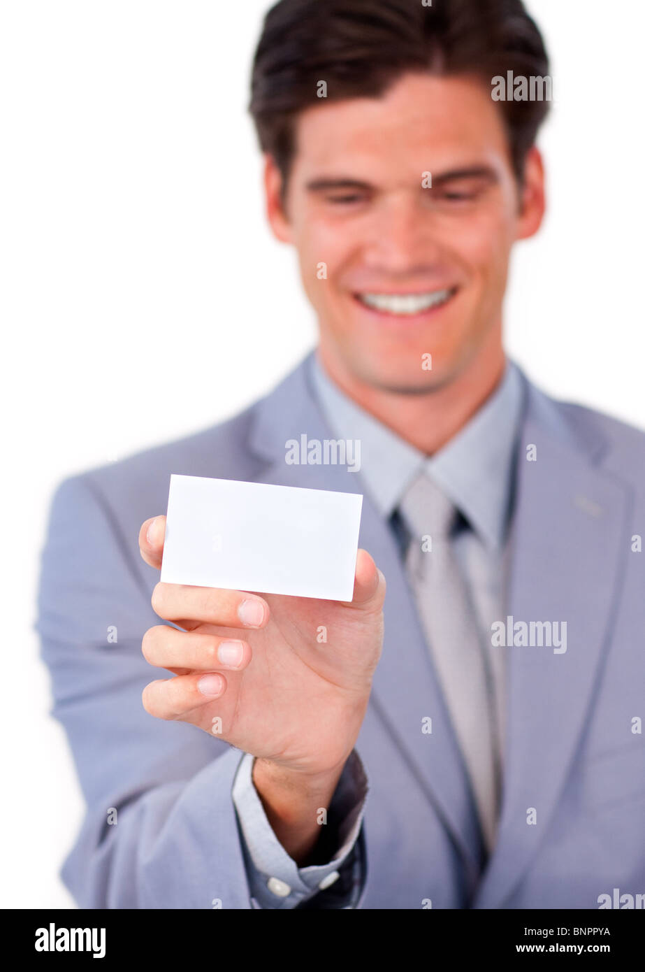Charming businessman holding a white card Stock Photo - Alamy