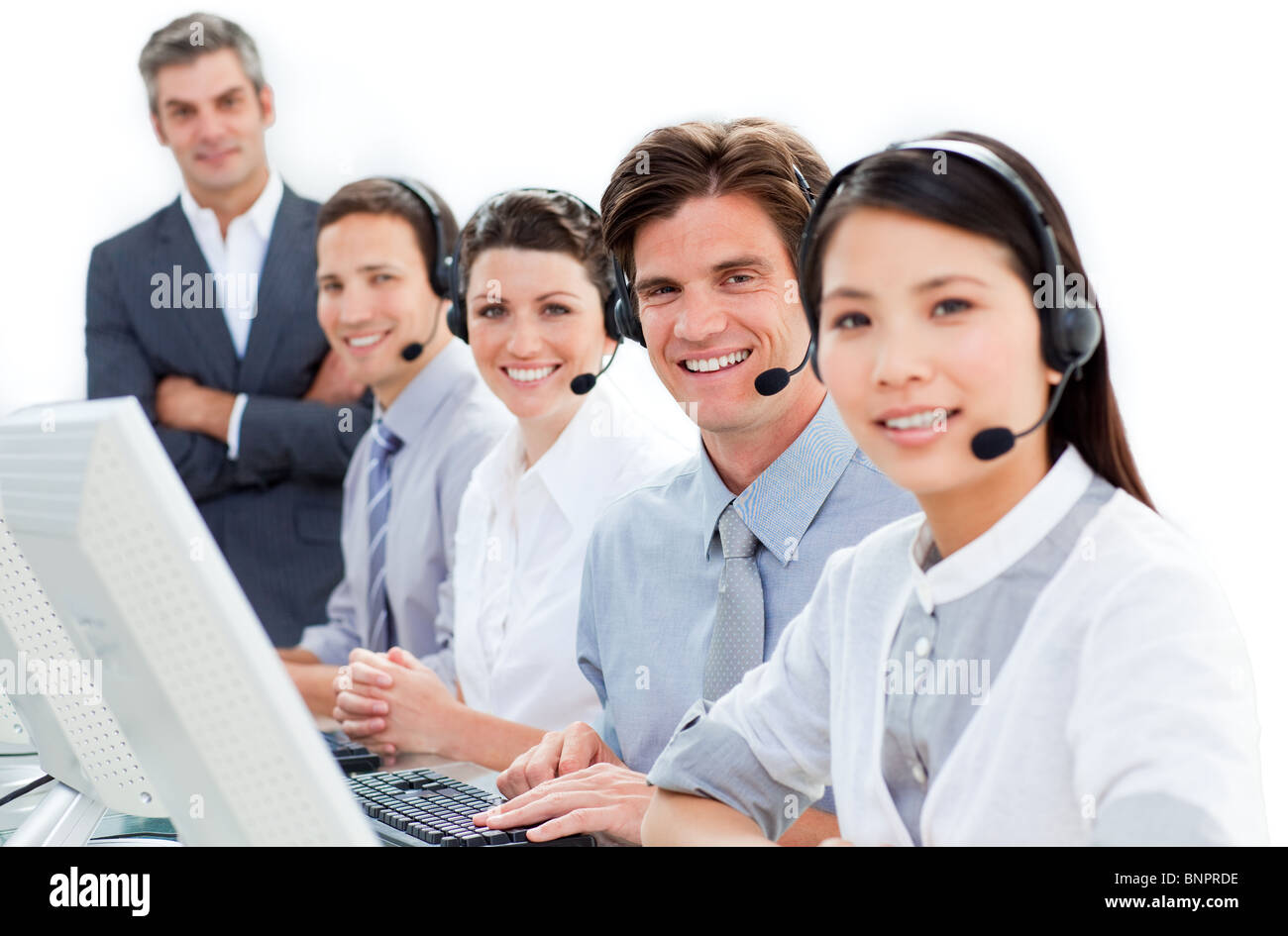 Various business co-workers working together Stock Photo - Alamy