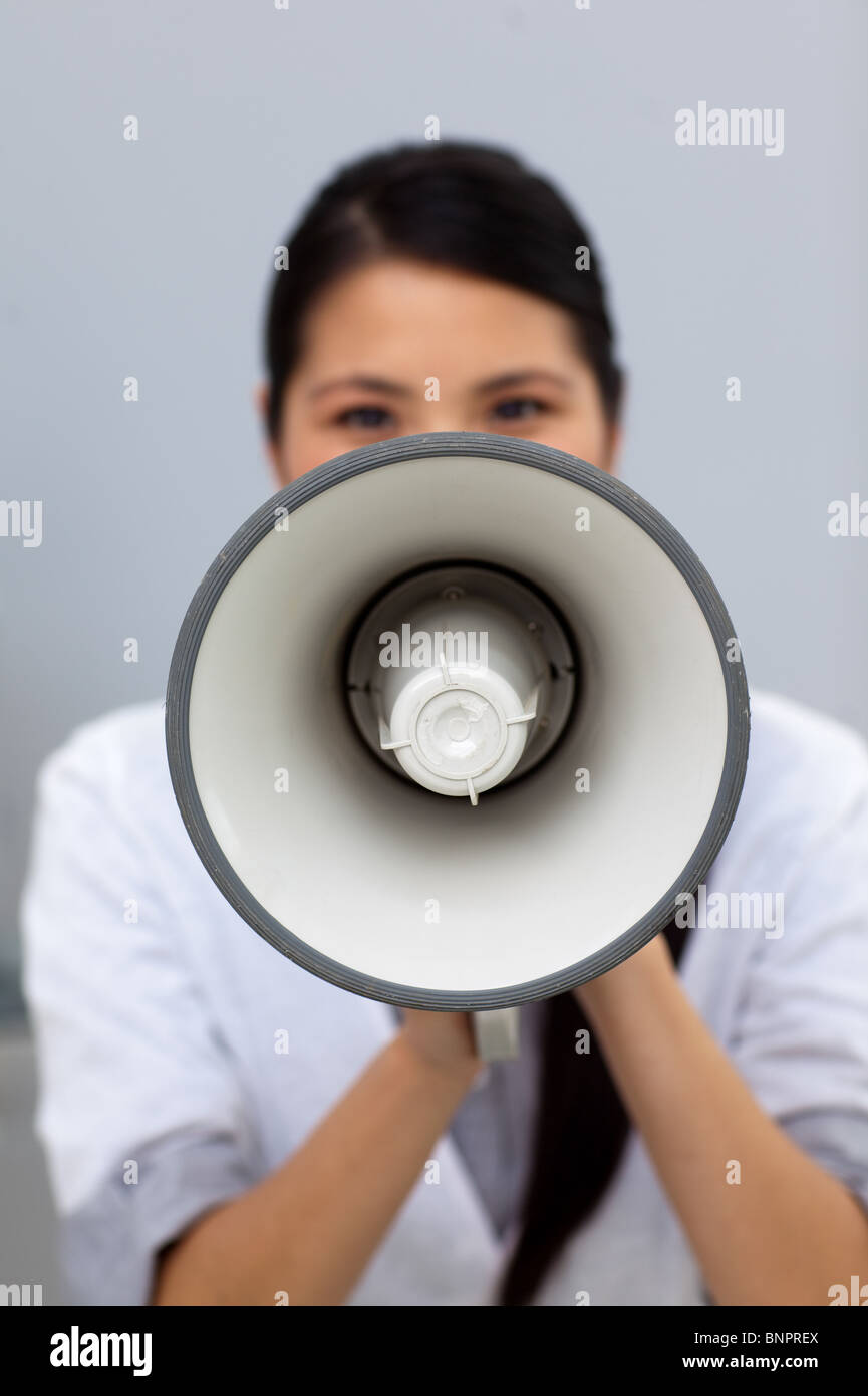 Young businesswoman shouting instructions Stock Photo - Alamy