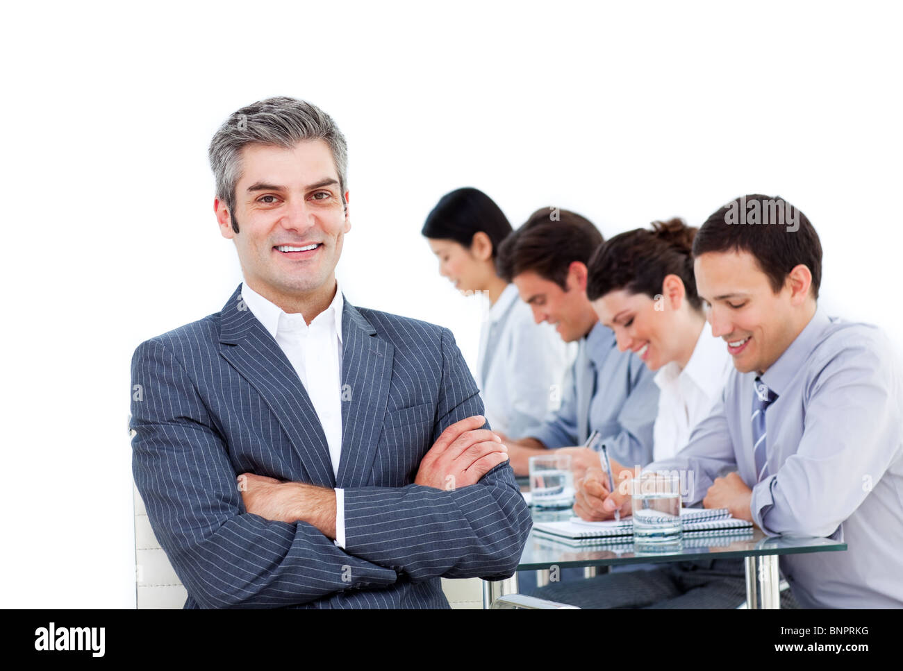 Happy business partners working together Stock Photo - Alamy