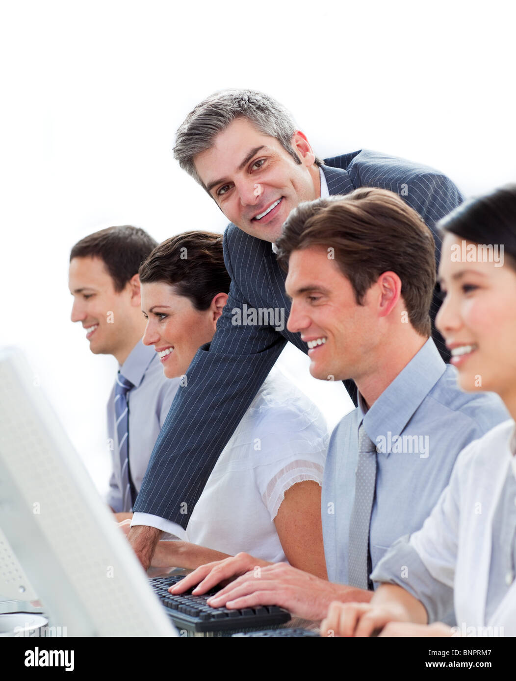 Enthousiastic business partners working together Stock Photo - Alamy