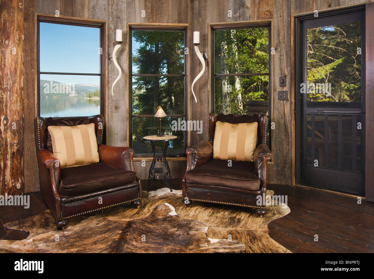 Luxurious Rustic Reading Room in Rural Setting with Lake View Stock ...