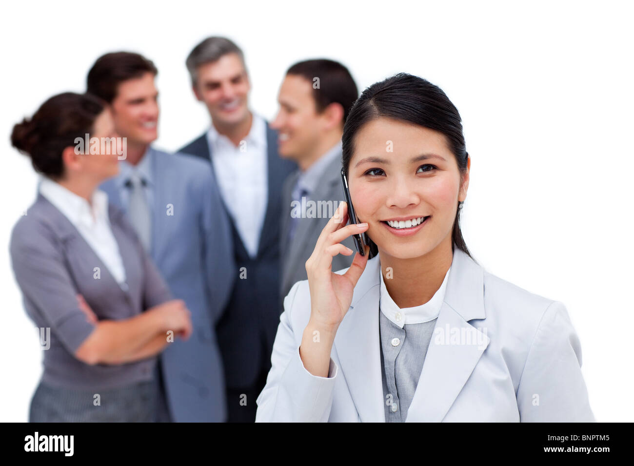 Positive business team working together Stock Photo - Alamy