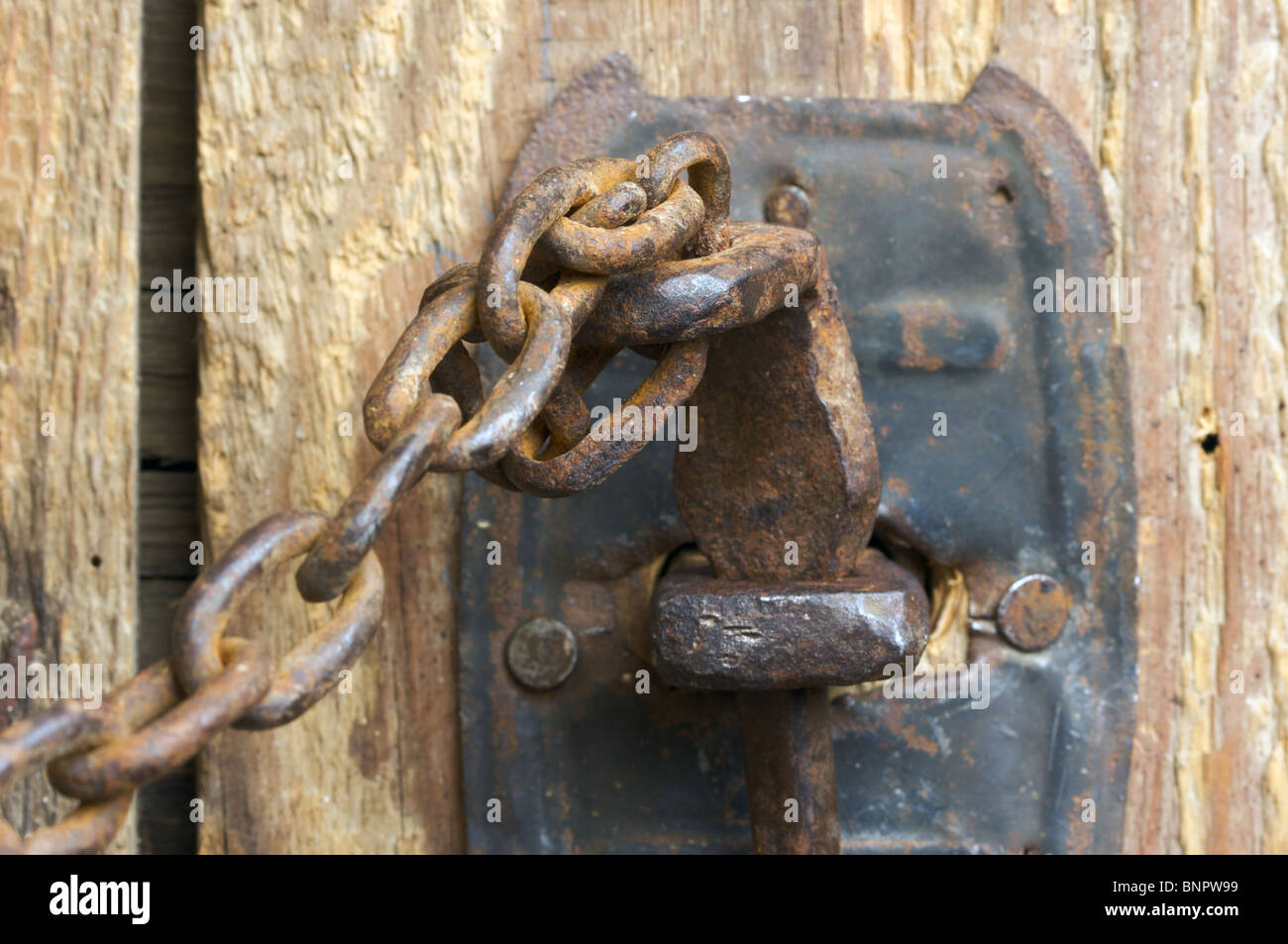 Antique Rusty Barn Door Latch and Chain Stock Photo - Alamy