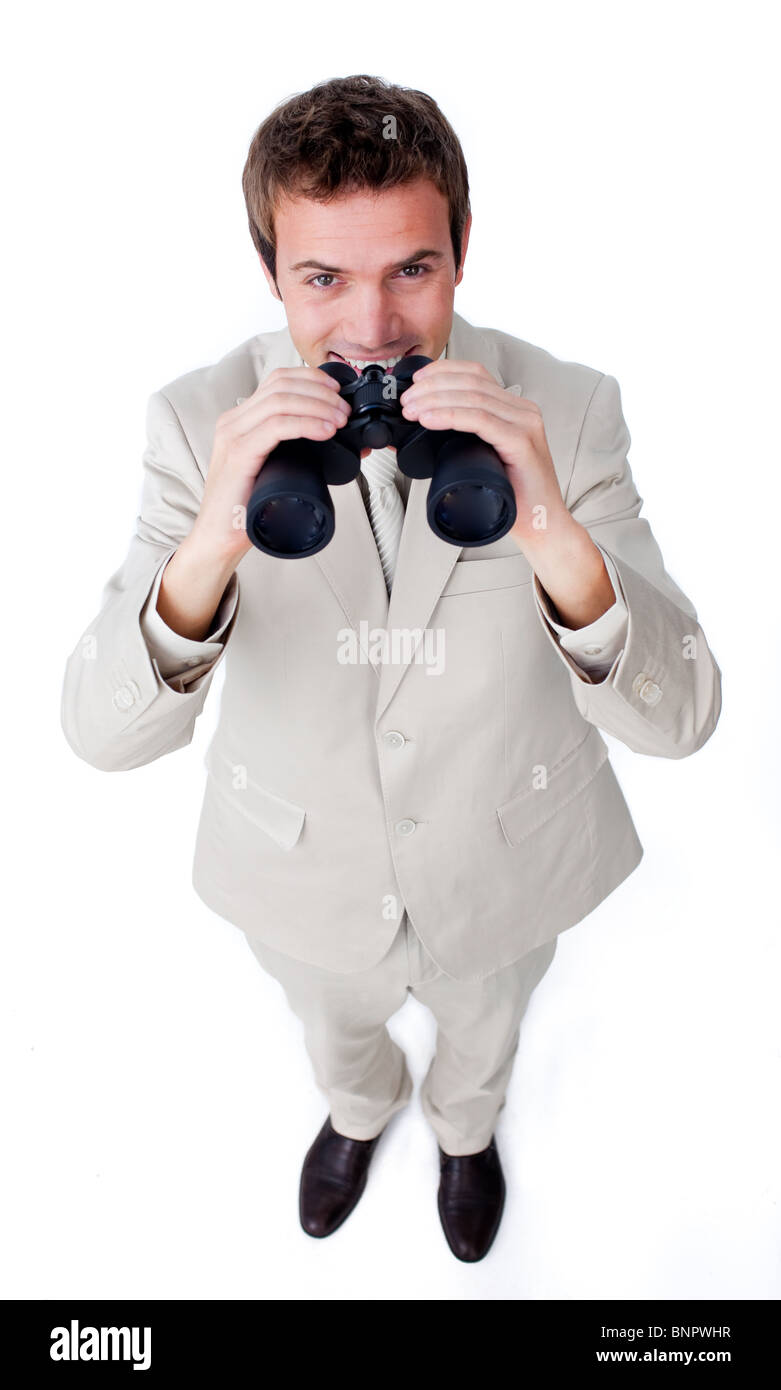 Charismatic businessman using binoculars Stock Photo - Alamy