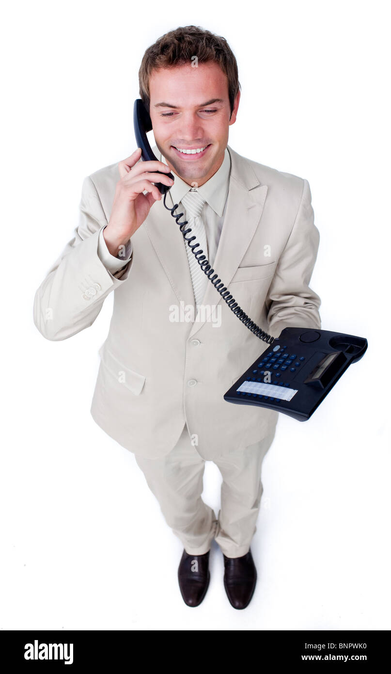 Busy businessman having a phone call Stock Photo - Alamy
