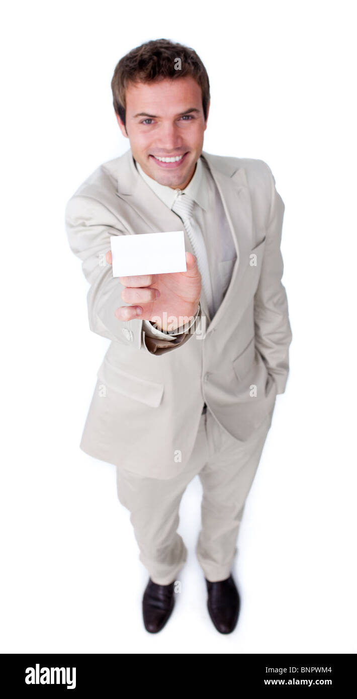 Attractive businessman holding a white card Stock Photo - Alamy