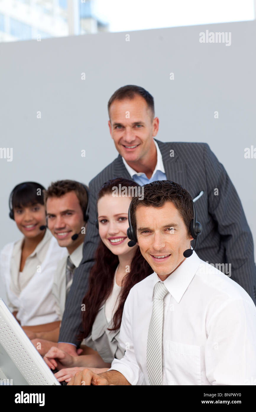Manager and his team working in a call center Stock Photo - Alamy