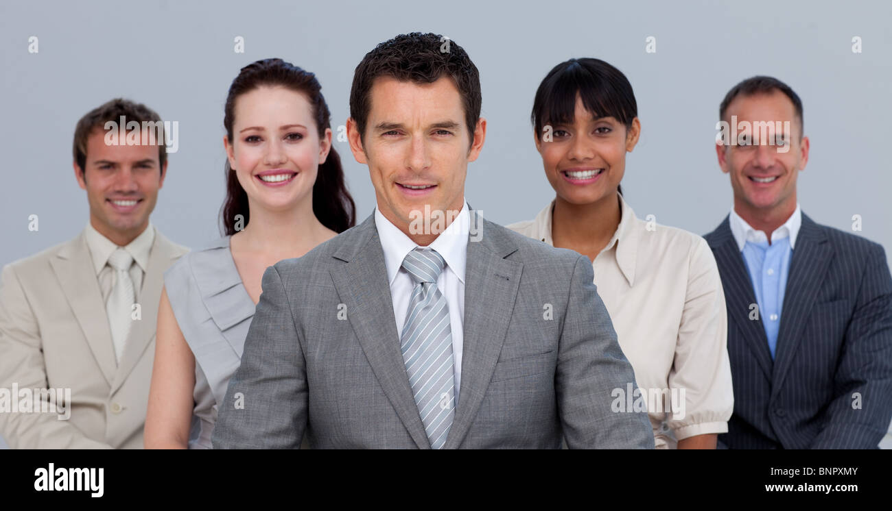 Positive business team in front of the camera Stock Photo - Alamy