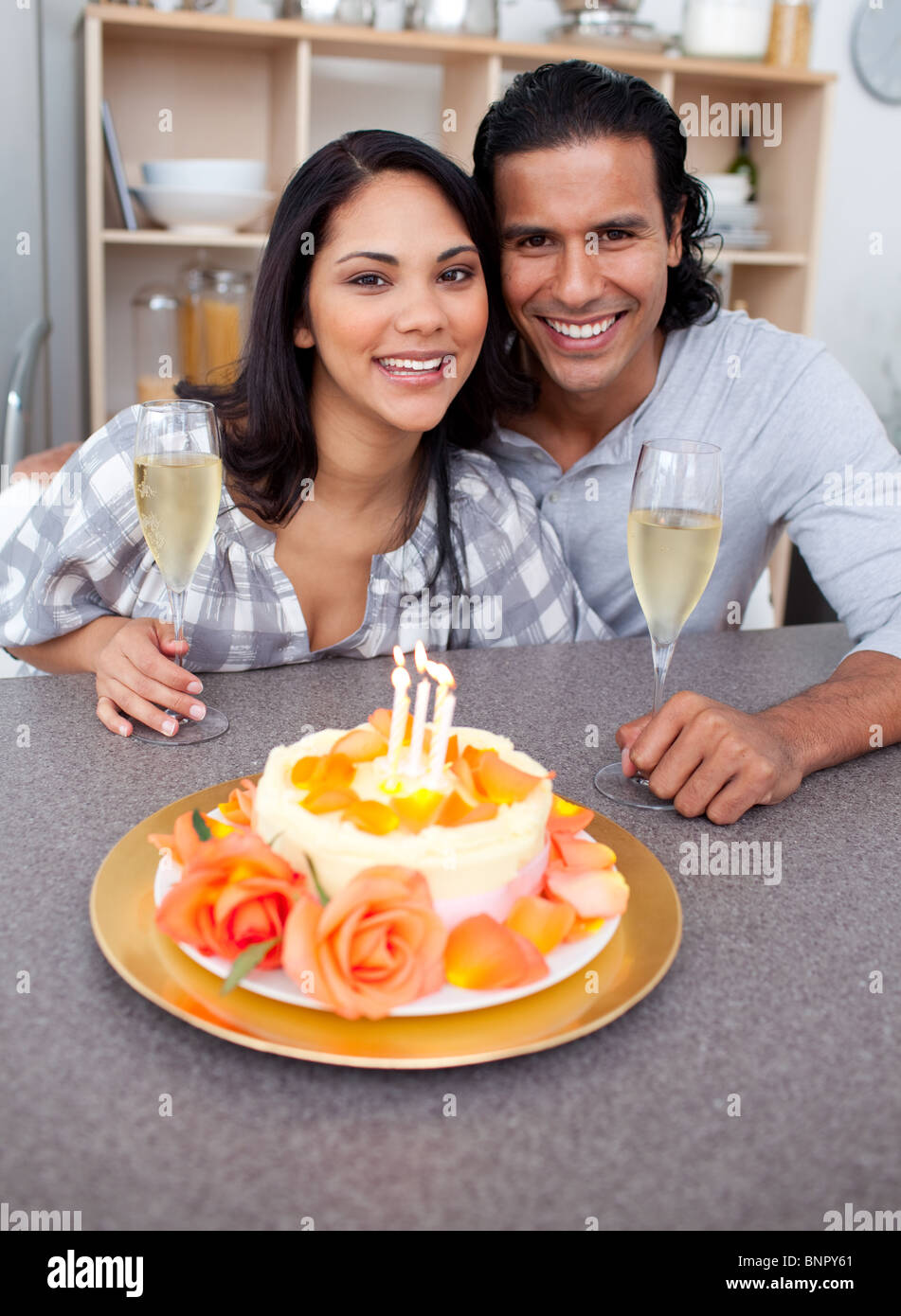 Enamoured couple celebrating Stock Photo - Alamy