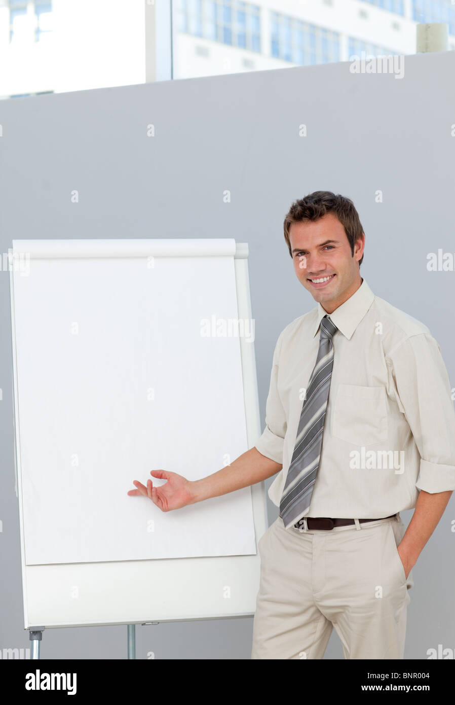 Attractive businessman giving a presentation Stock Photo - Alamy