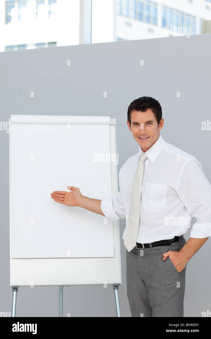 Attractive businessman giving a presentation Stock Photo - Alamy