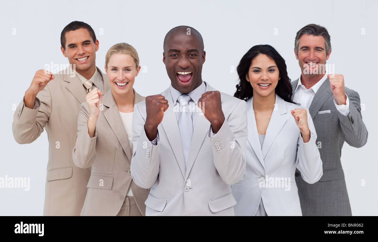 Happy and positive business team standing and smiling Stock Photo - Alamy