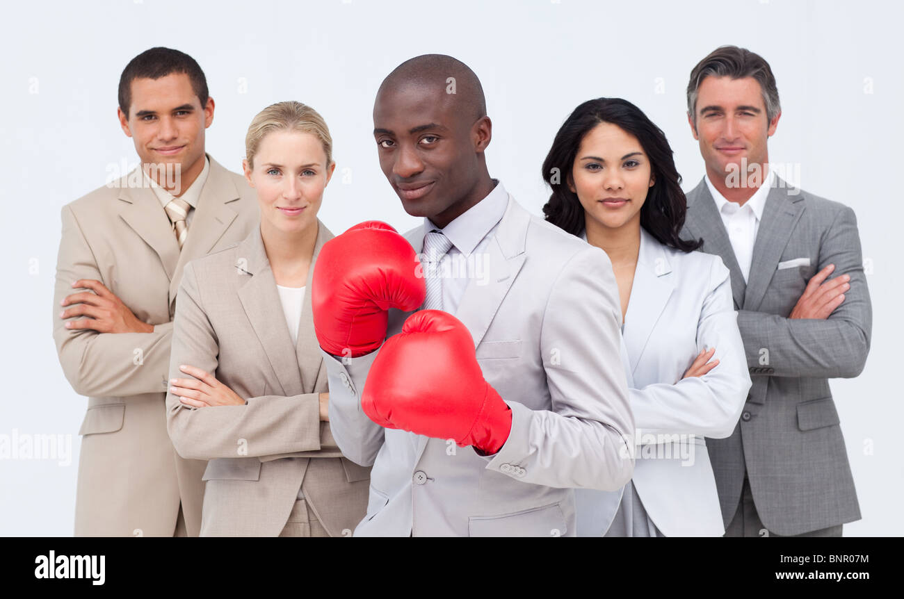 Businessman boxing and leading his team Stock Photo - Alamy