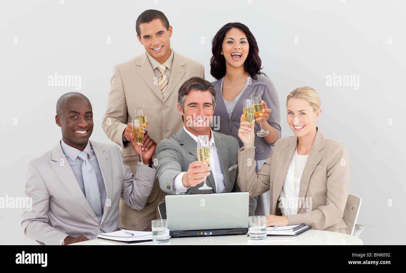 Business team drinking champagne Stock Photo - Alamy