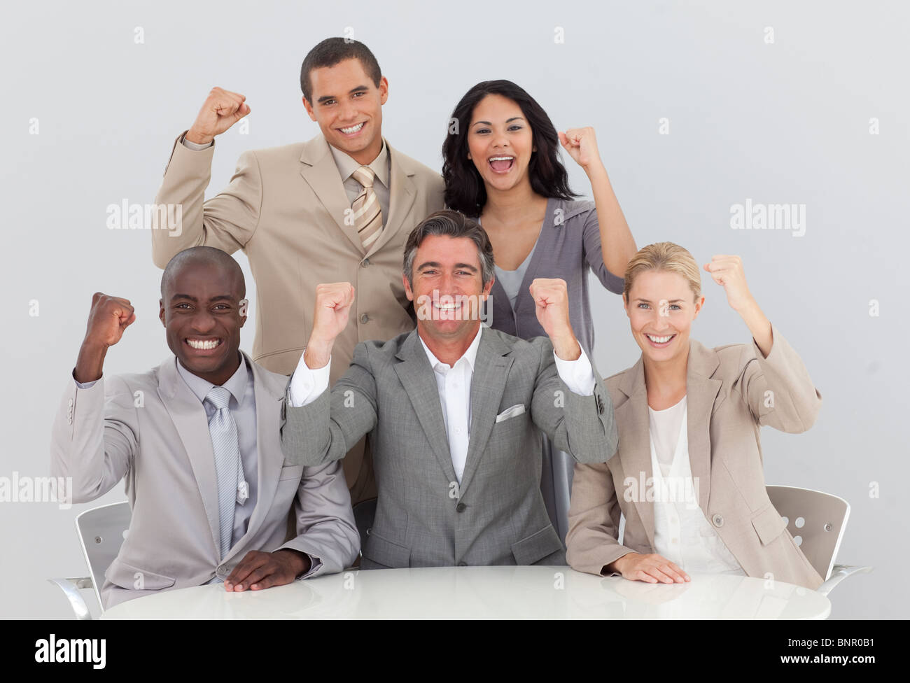 Business celebrating happy team hi-res stock photography and images - Alamy
