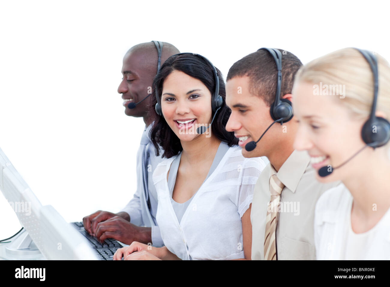 Happy business team in a call center Stock Photo - Alamy