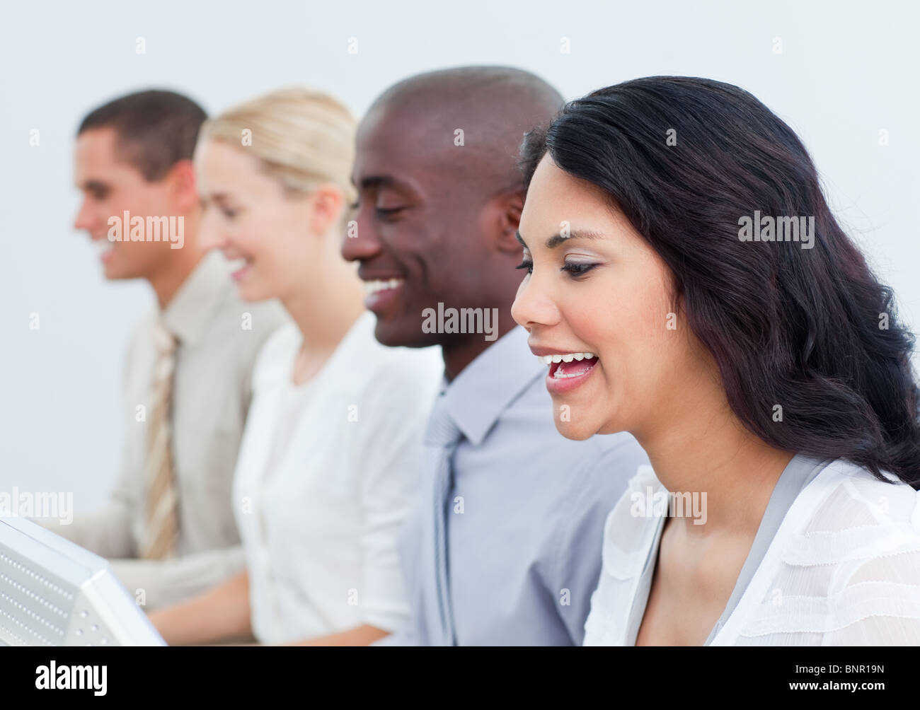 Presentation of a positive business team at work Stock Photo - Alamy