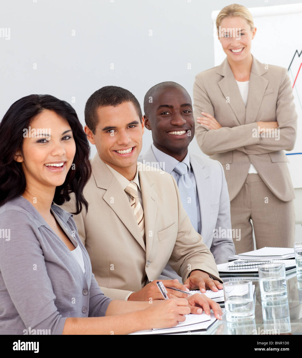 Potrait of a business team at a presentation Stock Photo - Alamy