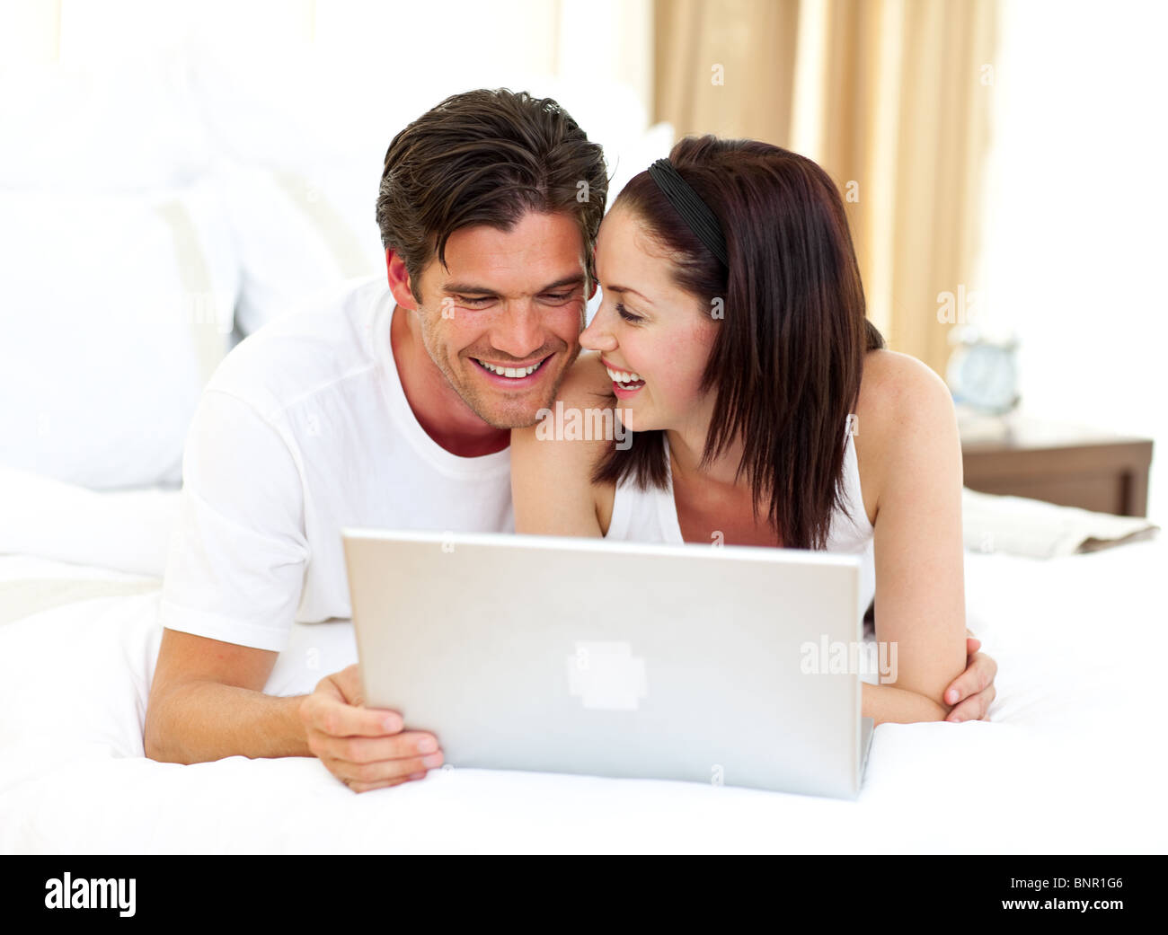 Happy family using technology Cut Out Stock Images & Pictures - Alamy