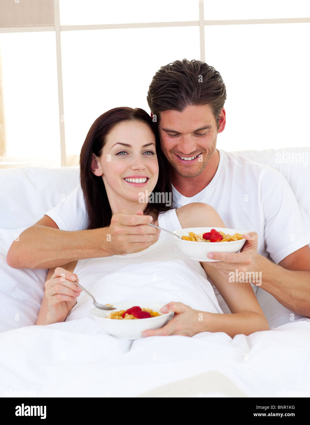 Romantic couple having breakfast Stock Photo - Alamy