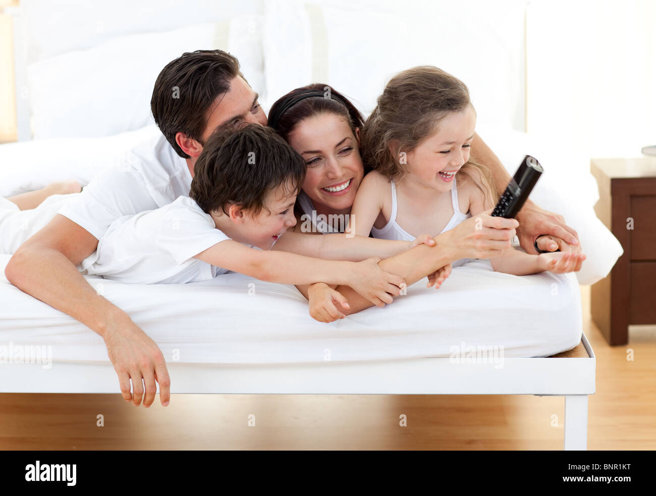 Lively family having fun Stock Photo - Alamy