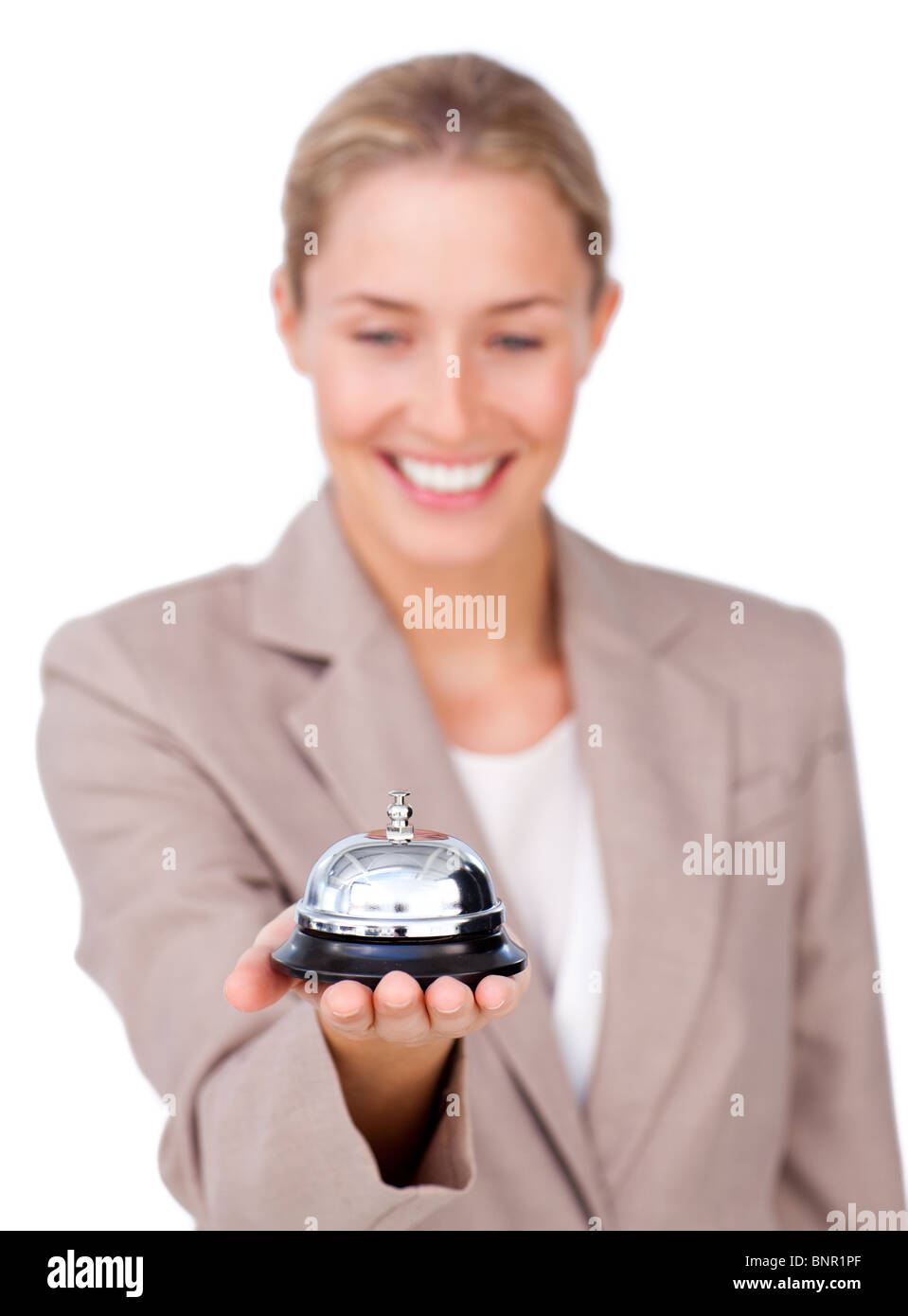 Attractive businesswoman holding a service bell Stock Photo - Alamy