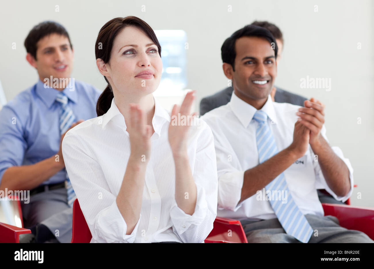 International business people clapping at a conference Stock Photo - Alamy