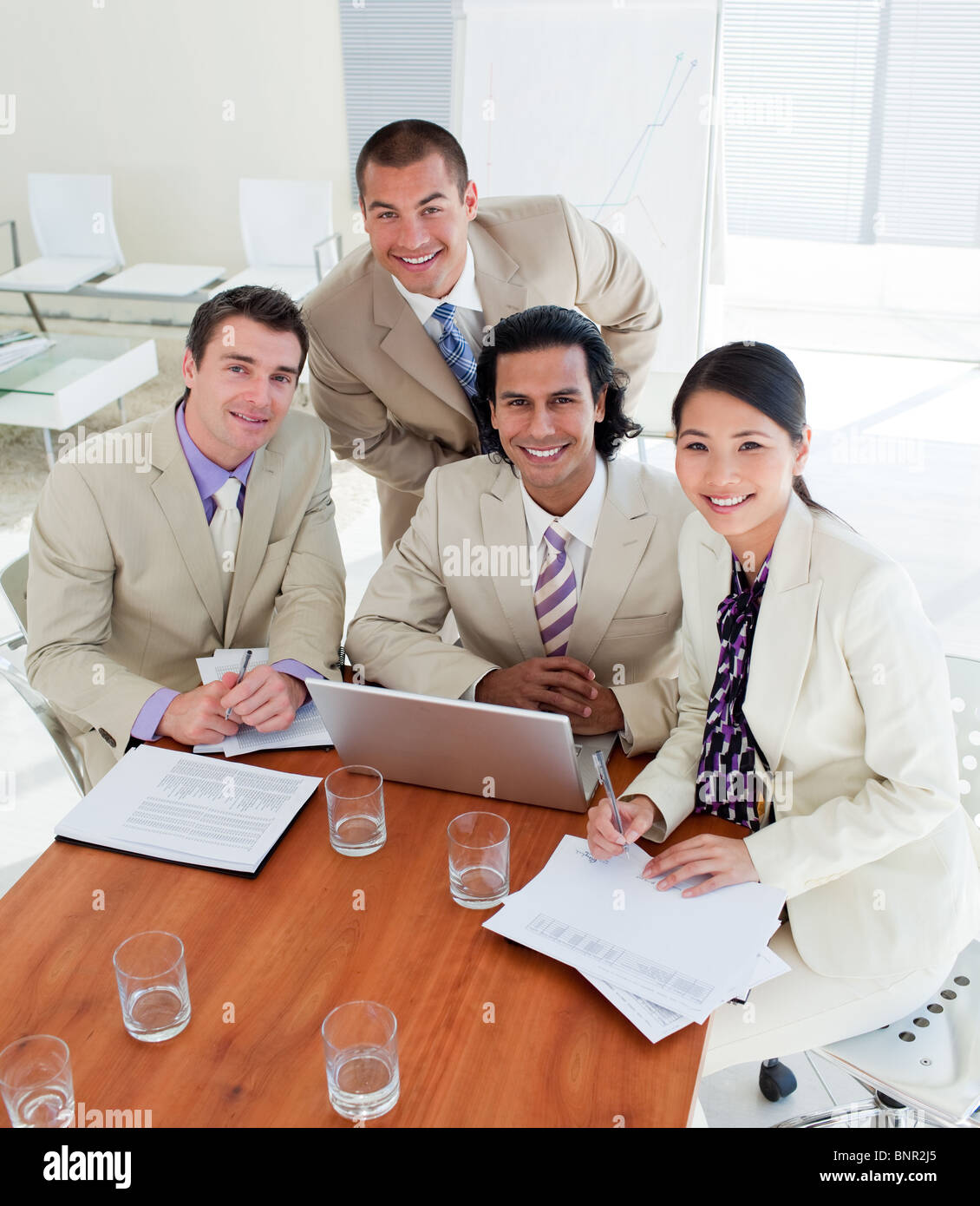 Confident business team having a brainstorming Stock Photo - Alamy