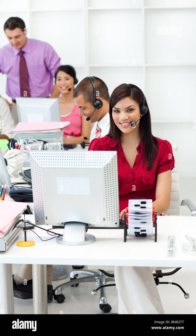 Business people with headset on working Stock Photo - Alamy
