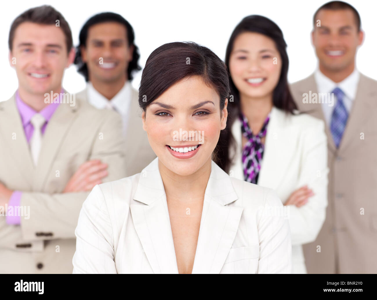Smiling business team lining up with headset on Stock Photo - Alamy