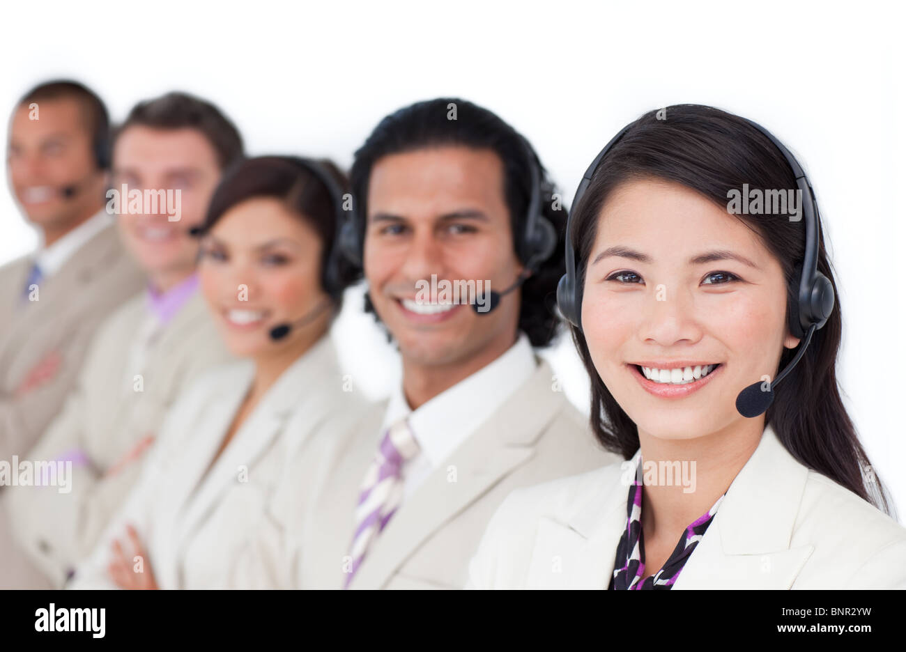 Concentrated business people working together Stock Photo - Alamy