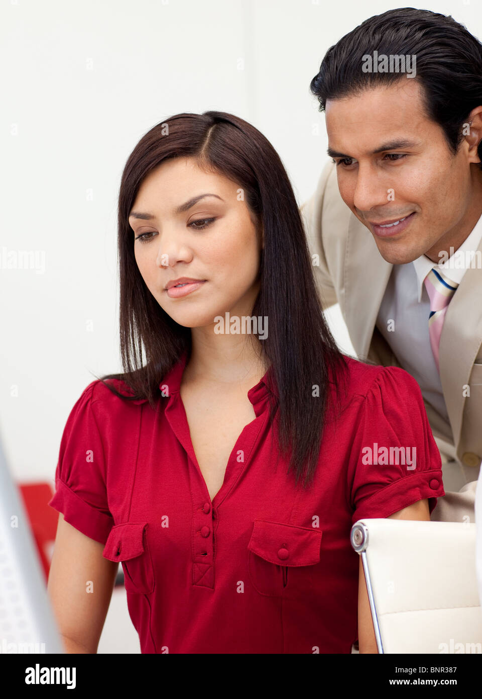 Concentrated business people working together Stock Photo - Alamy