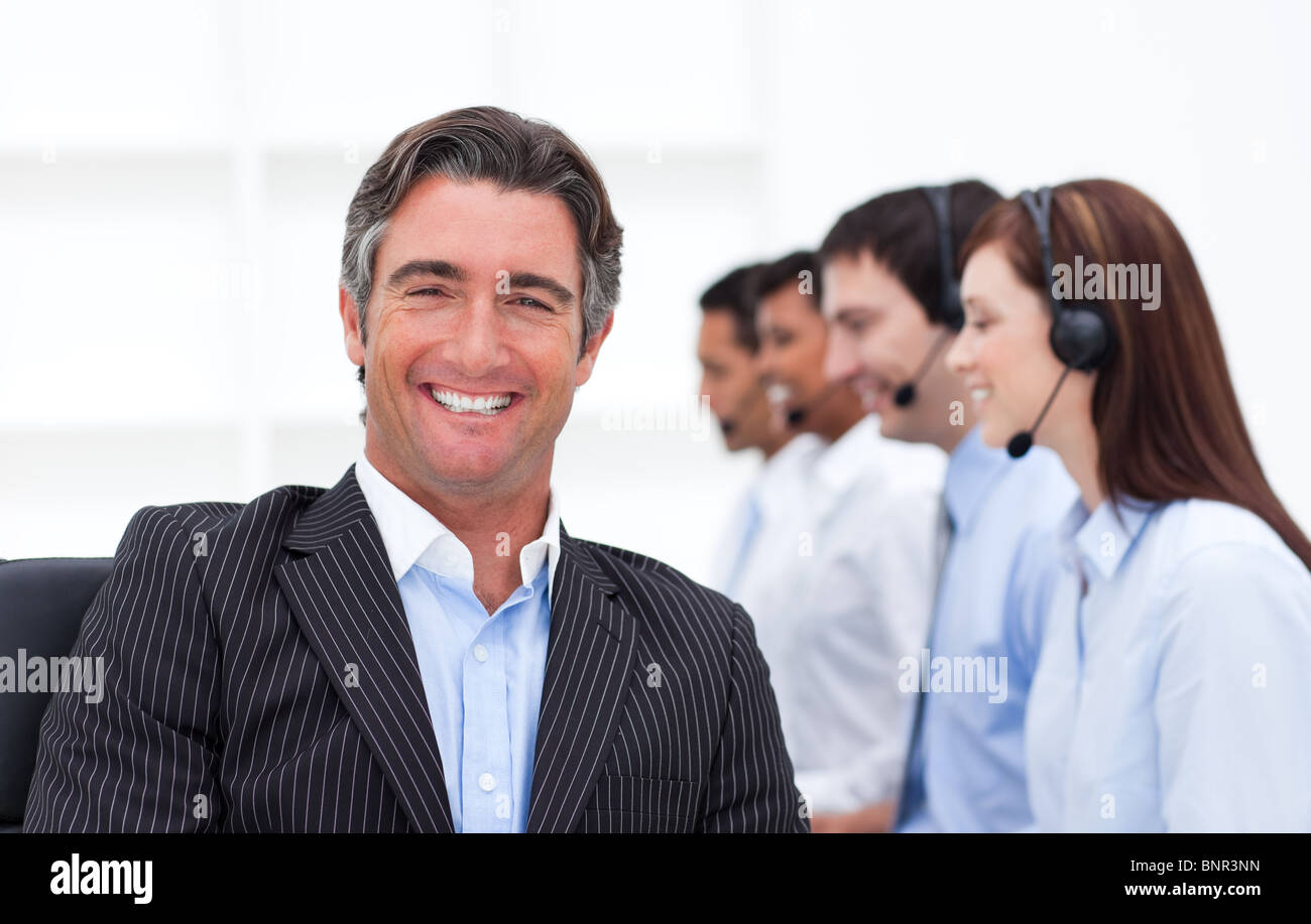 Confident manager presenting a call center Stock Photo - Alamy