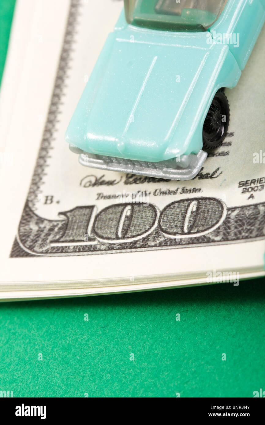 car and money Stock Photo - Alamy